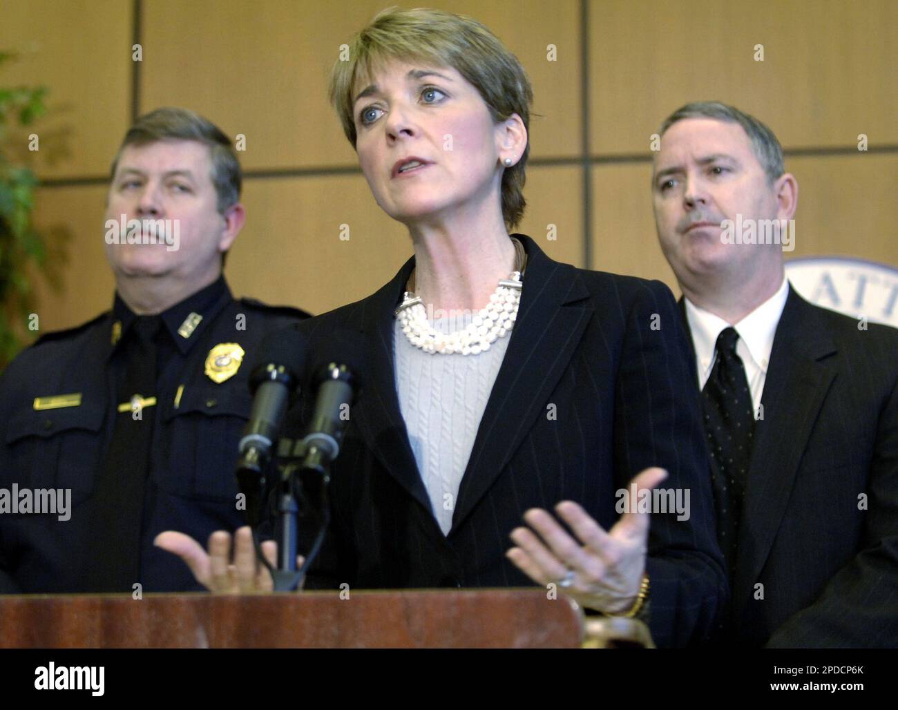 Middlesex County District Attorney Martha Coakley, center, speaks to ...