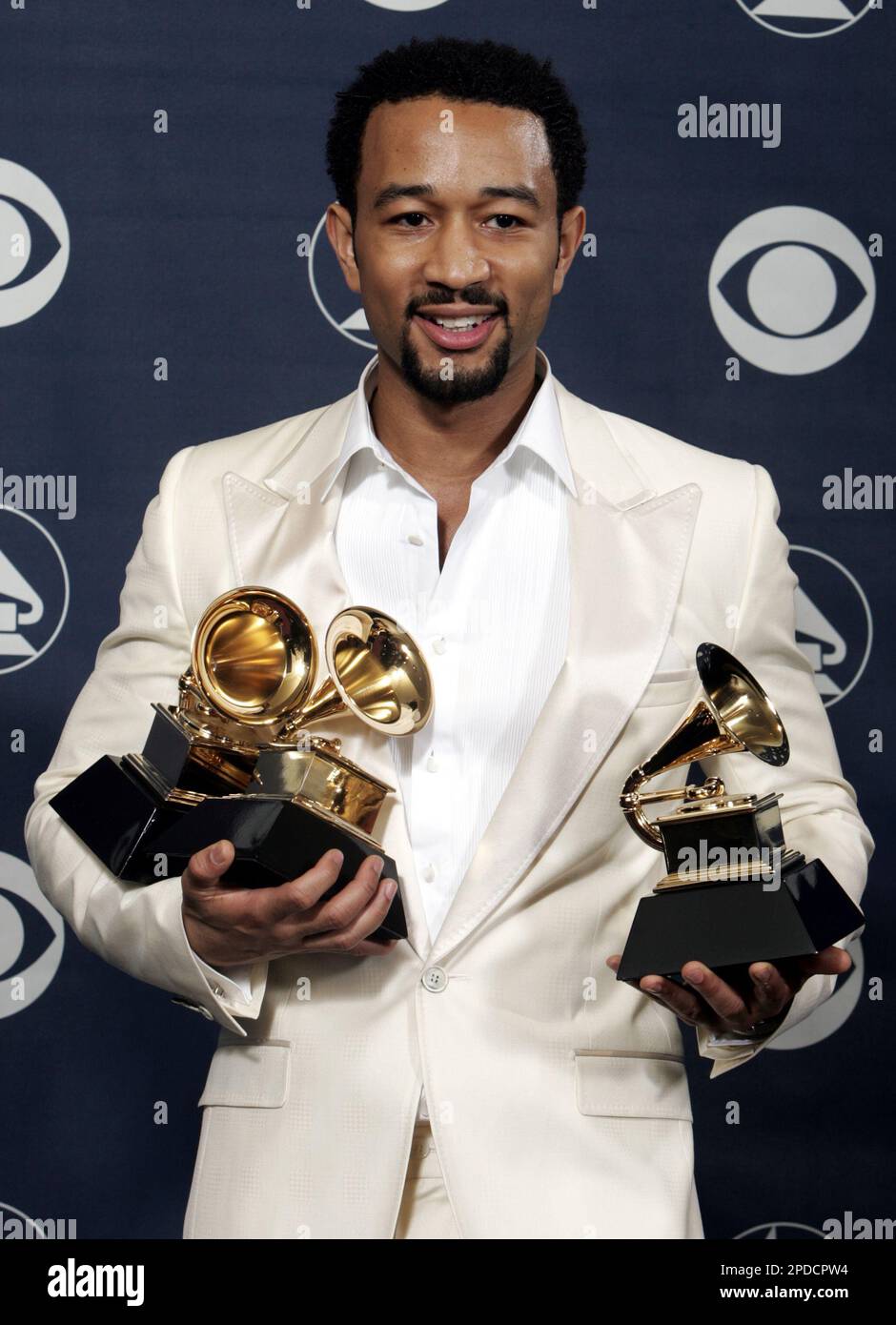 John Legend holds his Grammy's for best new artist, best R&B album, and ...