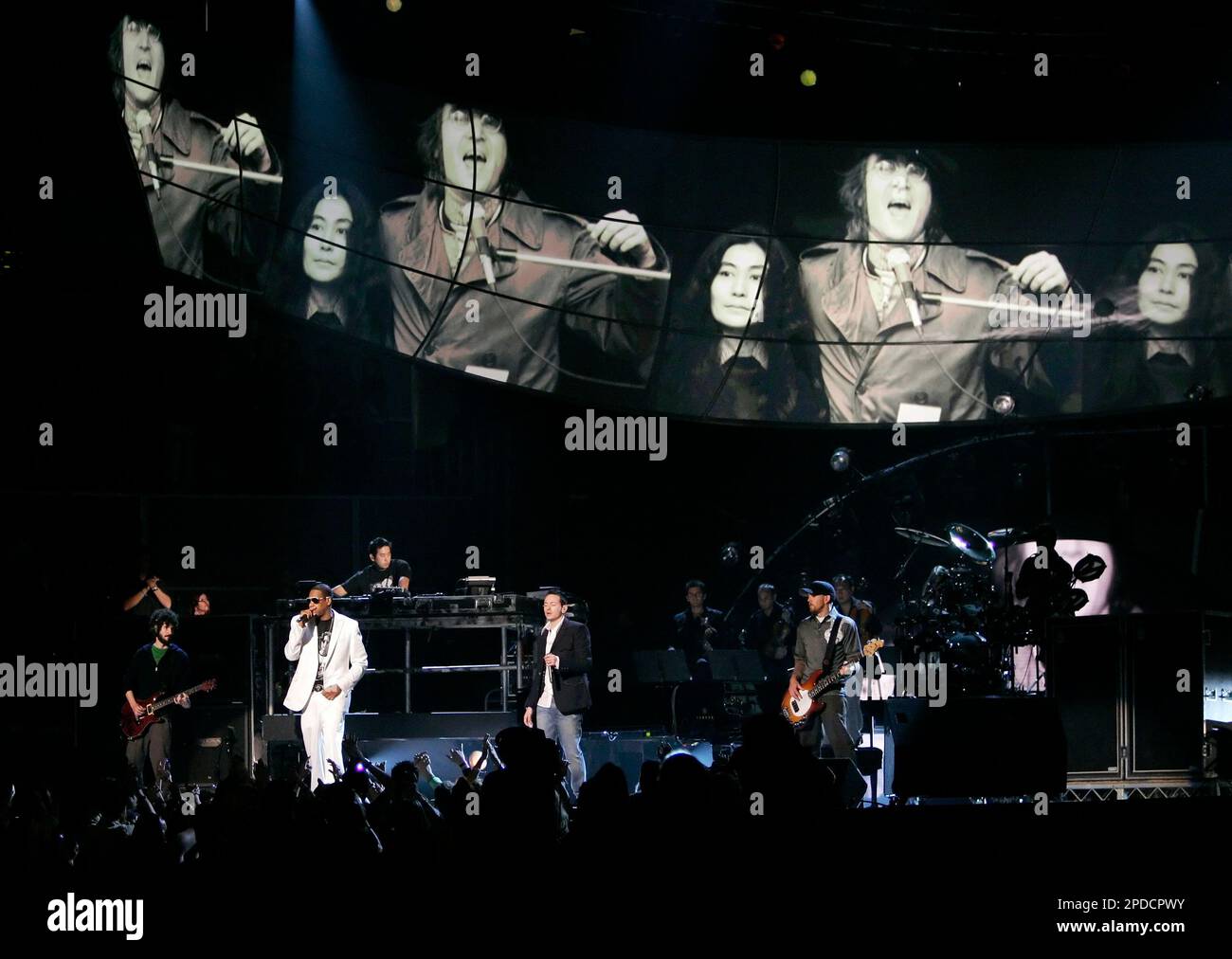 The group Linkin Park and rap singer Jay-Z, second from left, perform ...