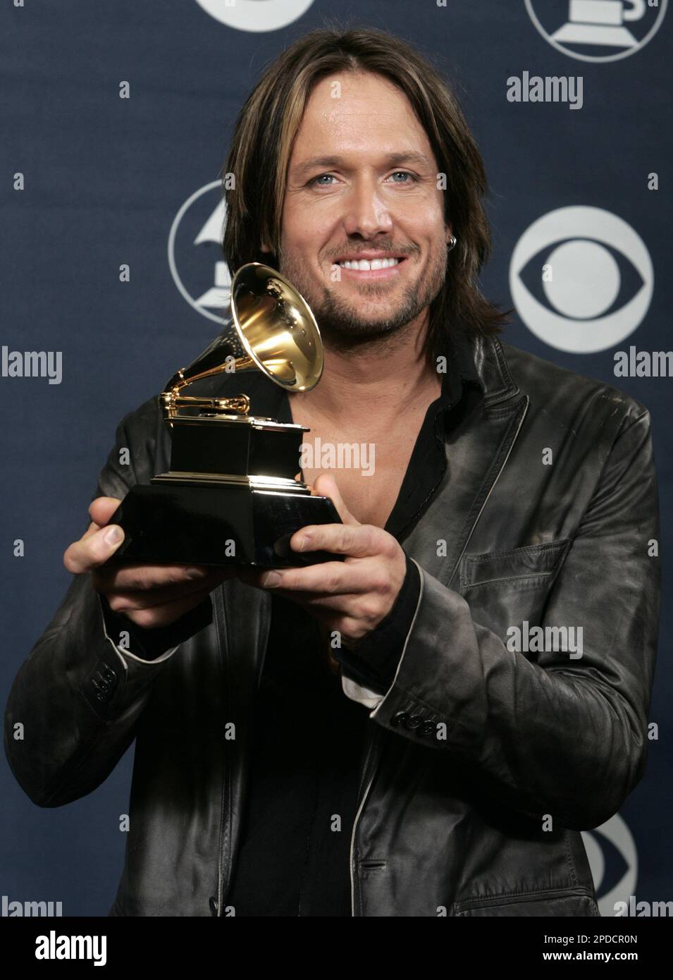 Australia's country singer Keith Urban holds his Grammy award for Best ...