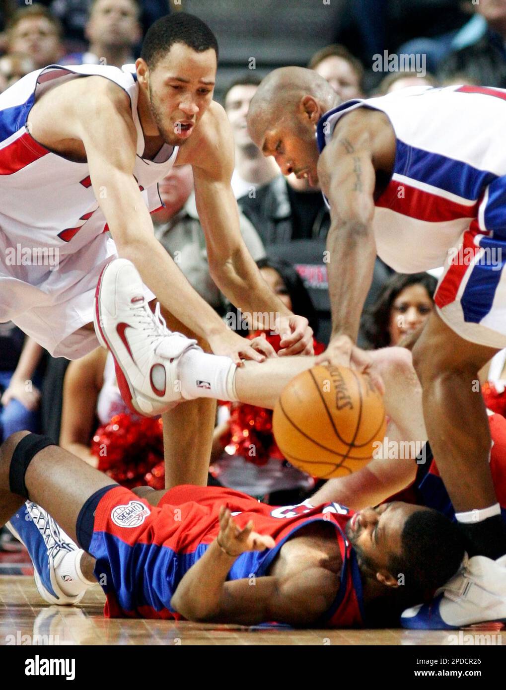 Detroit Pistons guard Chauncey Billups, right, knocks the ball away ...