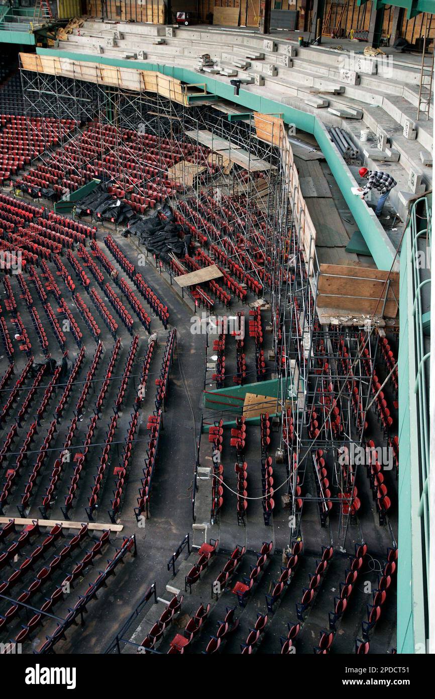 Construction worker Richard Armando, upper right, measures for future ...