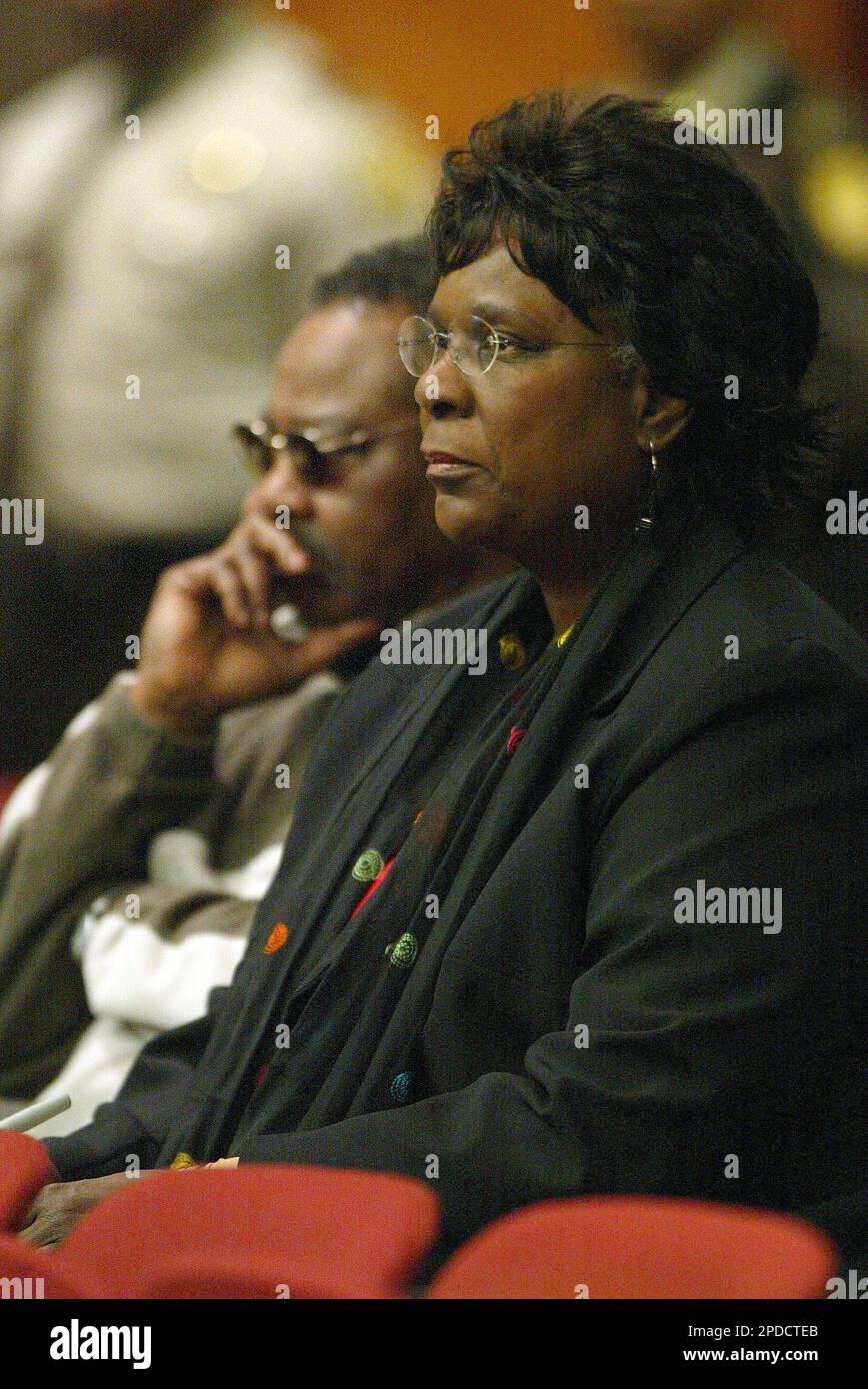 Parents of Brian Nichols, Gene and Claritha Nichols, listen to the ...