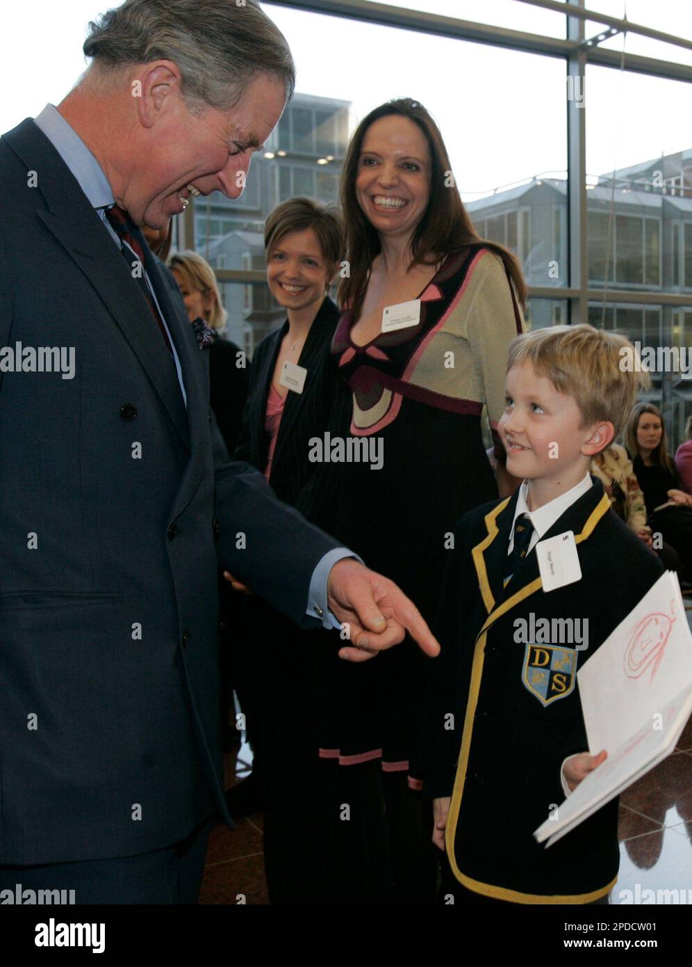 Britain's Prince Charles, The Prince of Wales, gestures as he looks at ...