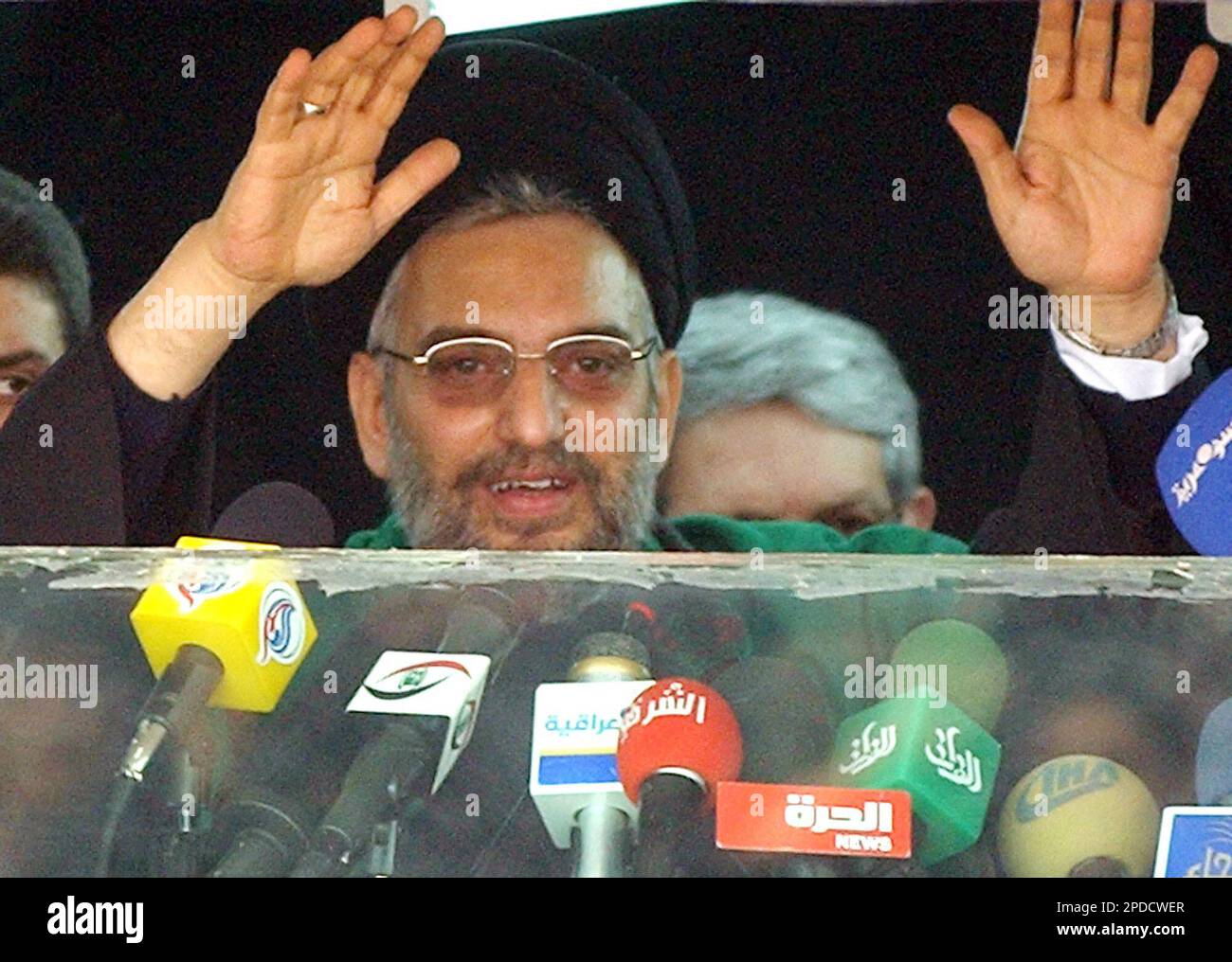 Iraq's top Shiite political leader, Abdul Aziz al-Hakim greets his ...