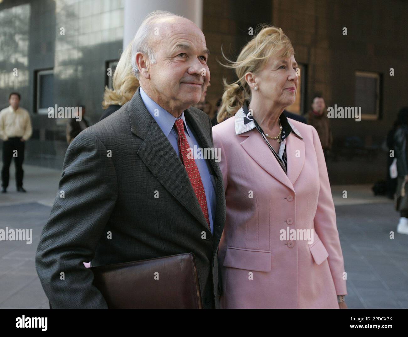 Former Enron CEO Kenneth Lay and his wife Linda wait for a traffic ...