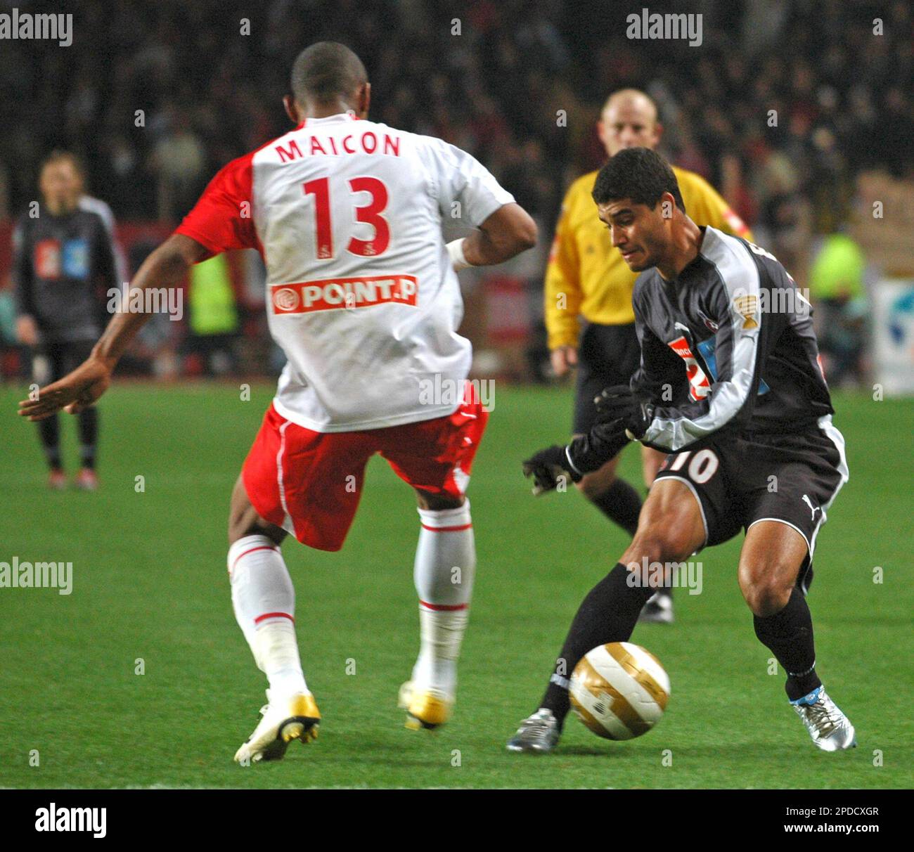 AS Monaco player Maicon Douglas Sisenando, left, tries to stop Ederson ...