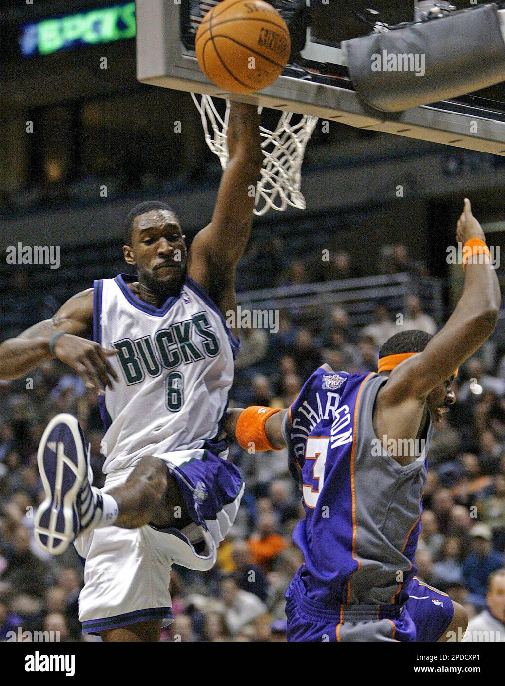 ** FILE ** Milwaukee Bucks' Joe Smith (8) blocks a shot by Phoenix Suns ...