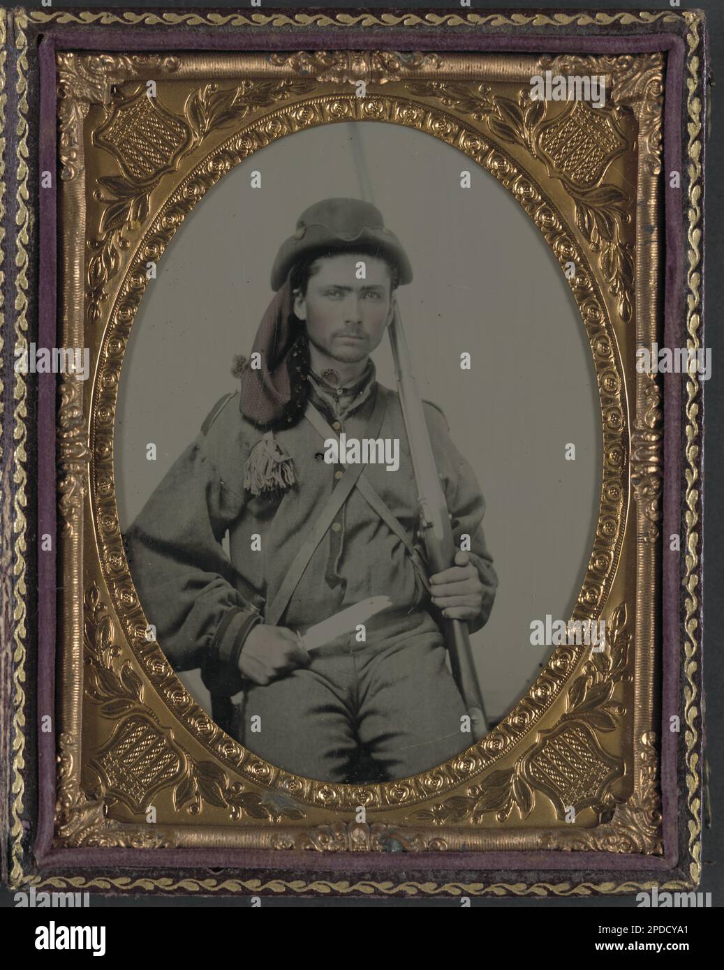 Unidentified soldier in Confederate infantry uniform with musket and ...