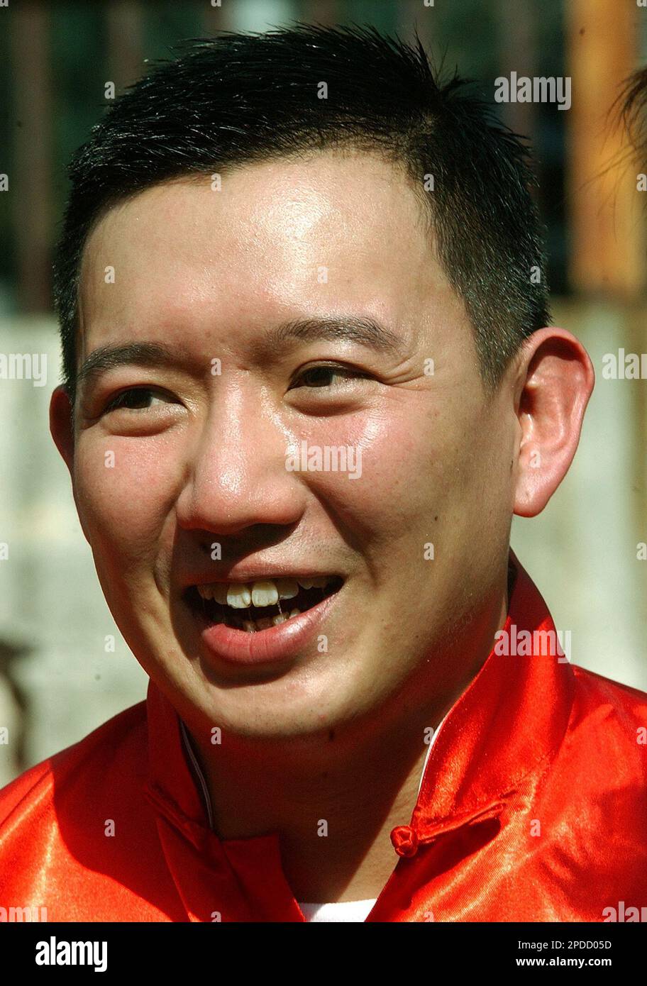 Hong Kong actor Chapman To smiles during a Chinese new year celebration ...
