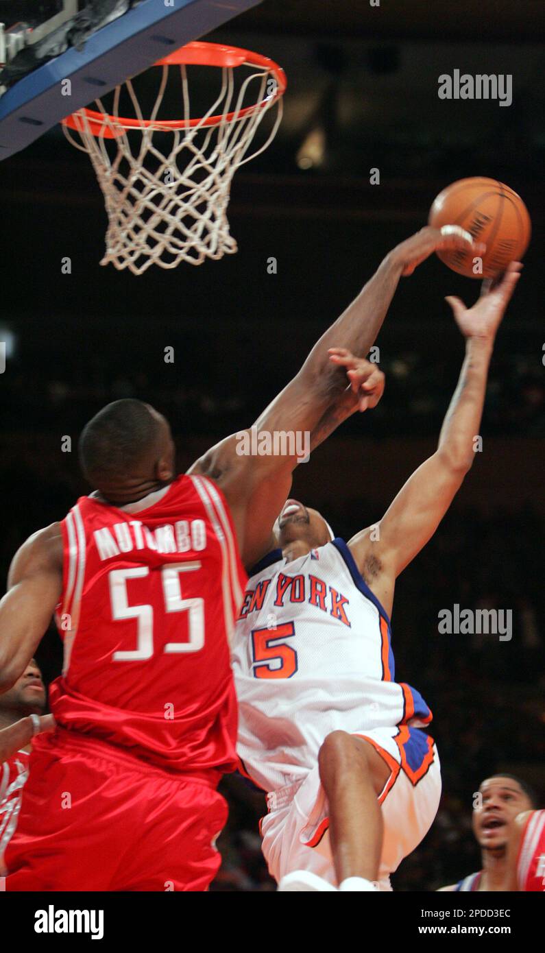 Houston Rockets Dikembe Mutombo blocks the shot as New York Knicks ...