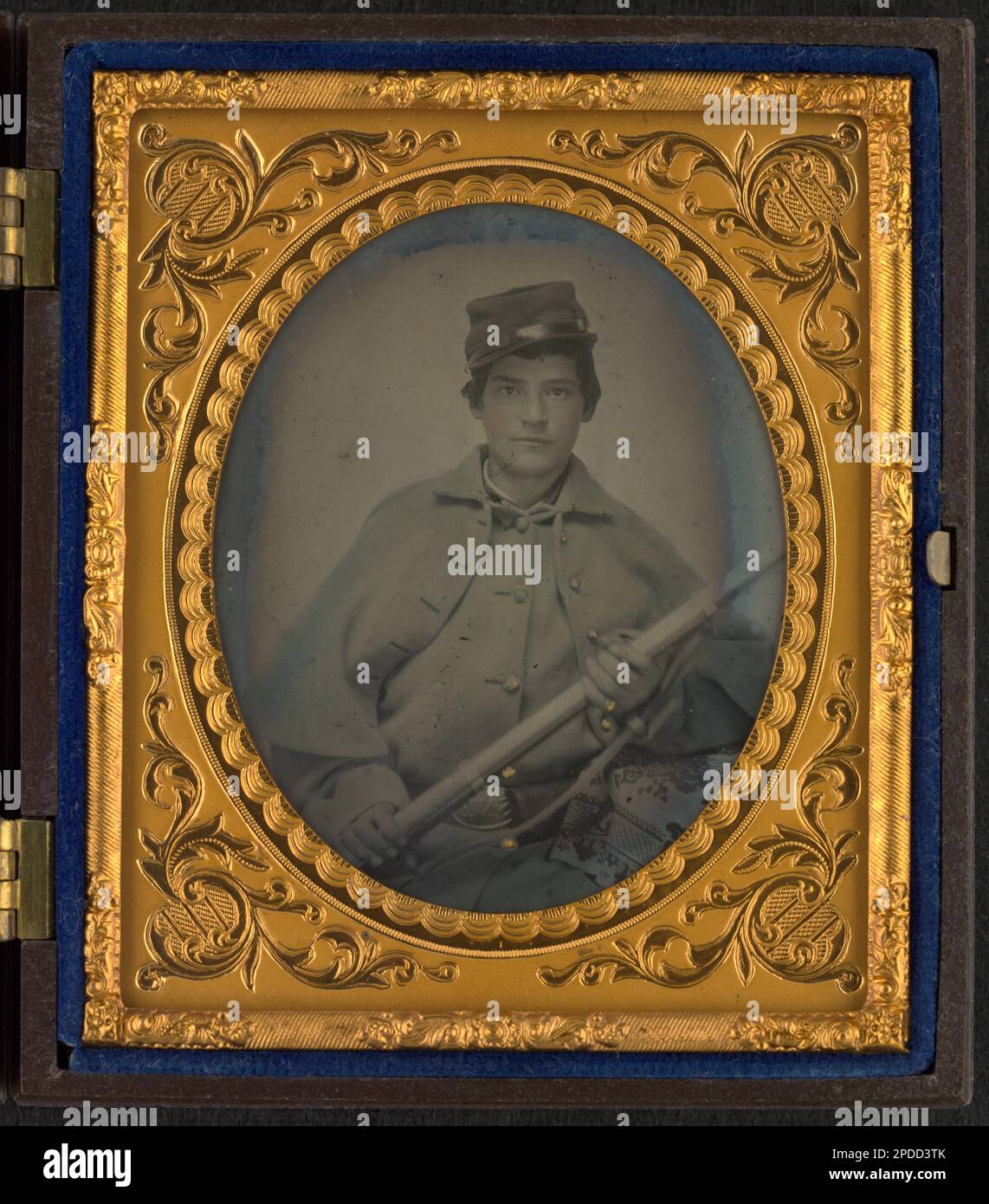 Unidentified soldier in uniform with New York state belt buckle holding ...