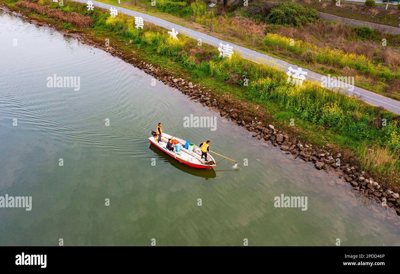 PINGXIANG, CHINA - MARCH 13, 2023 - River cleaners patrol the Xiangdong ...