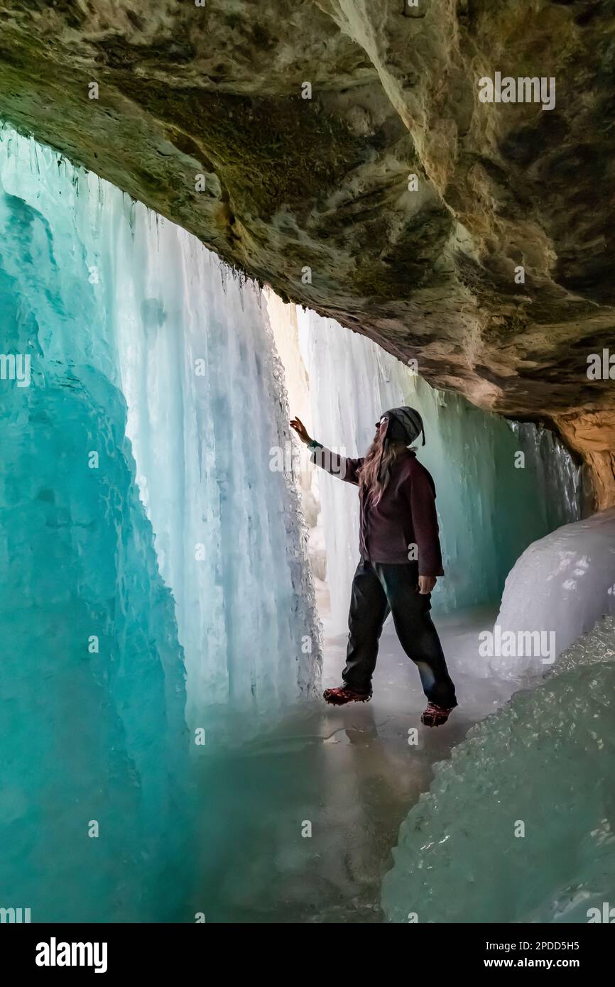 Karen Rentz exploring behind the Curtains ice formation used by ice ...