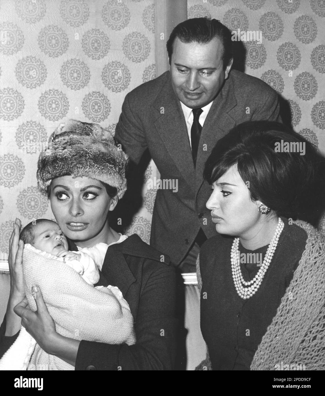 Actress Sophia Loren, left, holds the little Alessandra Mussolini in ...