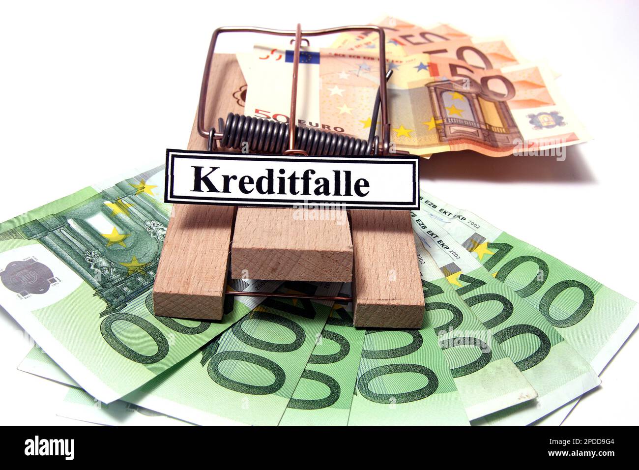 wooden mousetrap with Euo bills and sign lettering Kreditfalle, credit ...