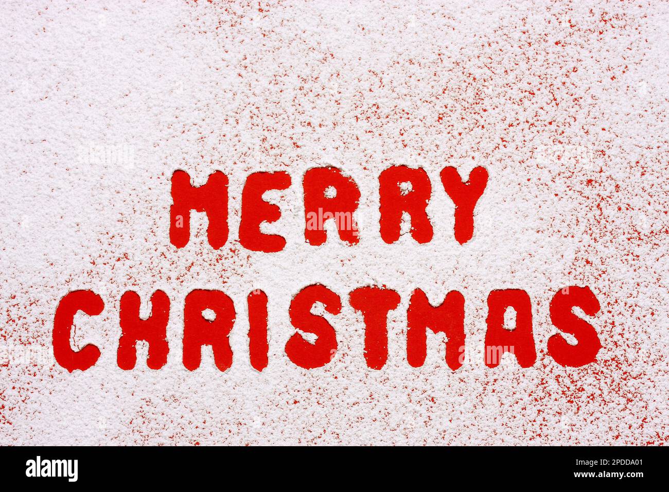 red writing Merry Christmas, on snow Stock Photo - Alamy