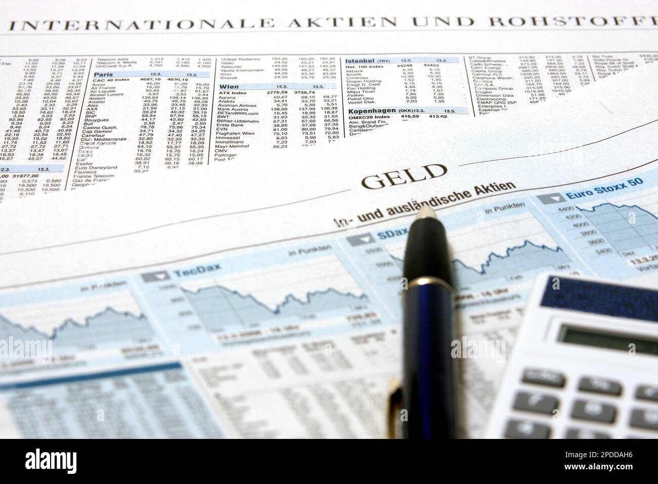 page with stock-market infos in a newspaper, and ballpen Stock Photo ...