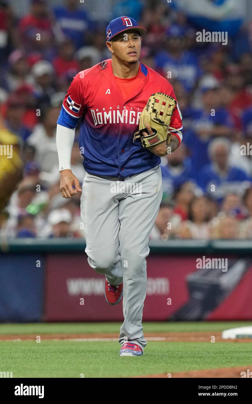 Dominican Republic third baseman Manny Machado (13) runs to the dugout ...