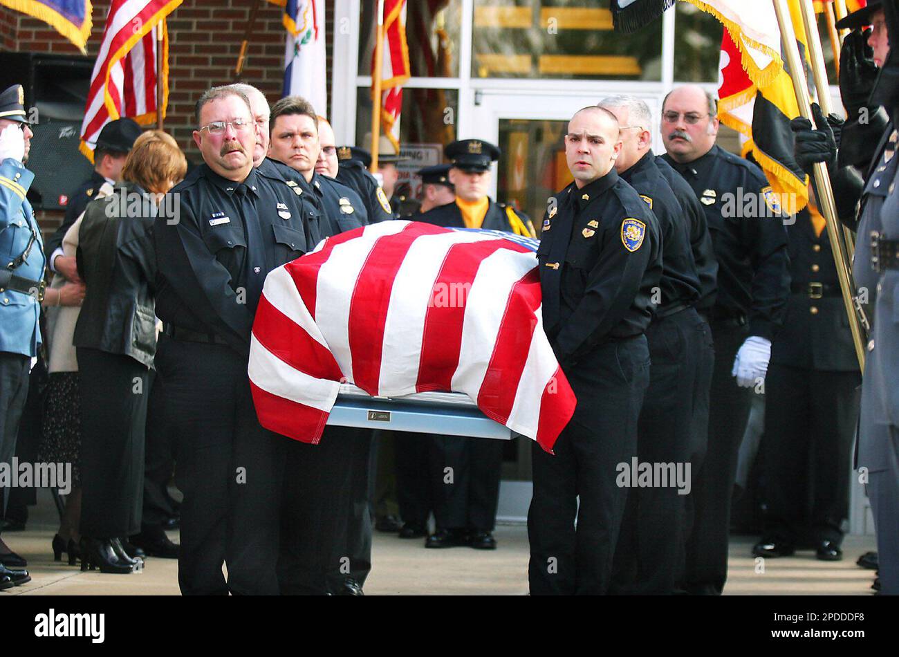 Correctional officers carry the casket of Jeffrey Alan Wroten ...