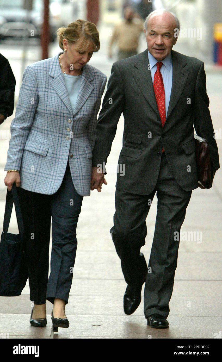 Enron founder Ken Lay and his wife, Linda walk to the federal ...