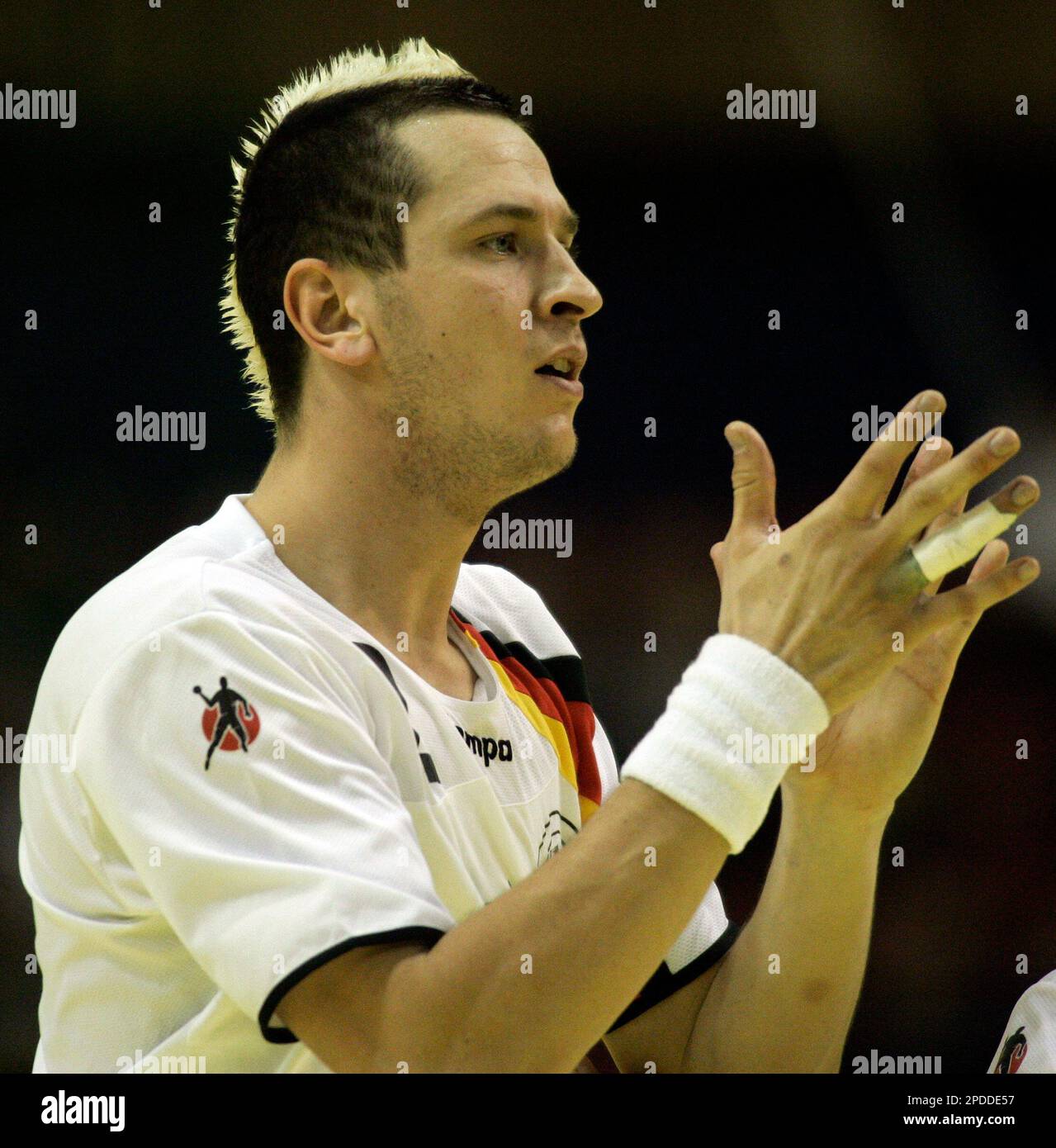 Germany's Pascal Hens applauds during the main round match of the ...