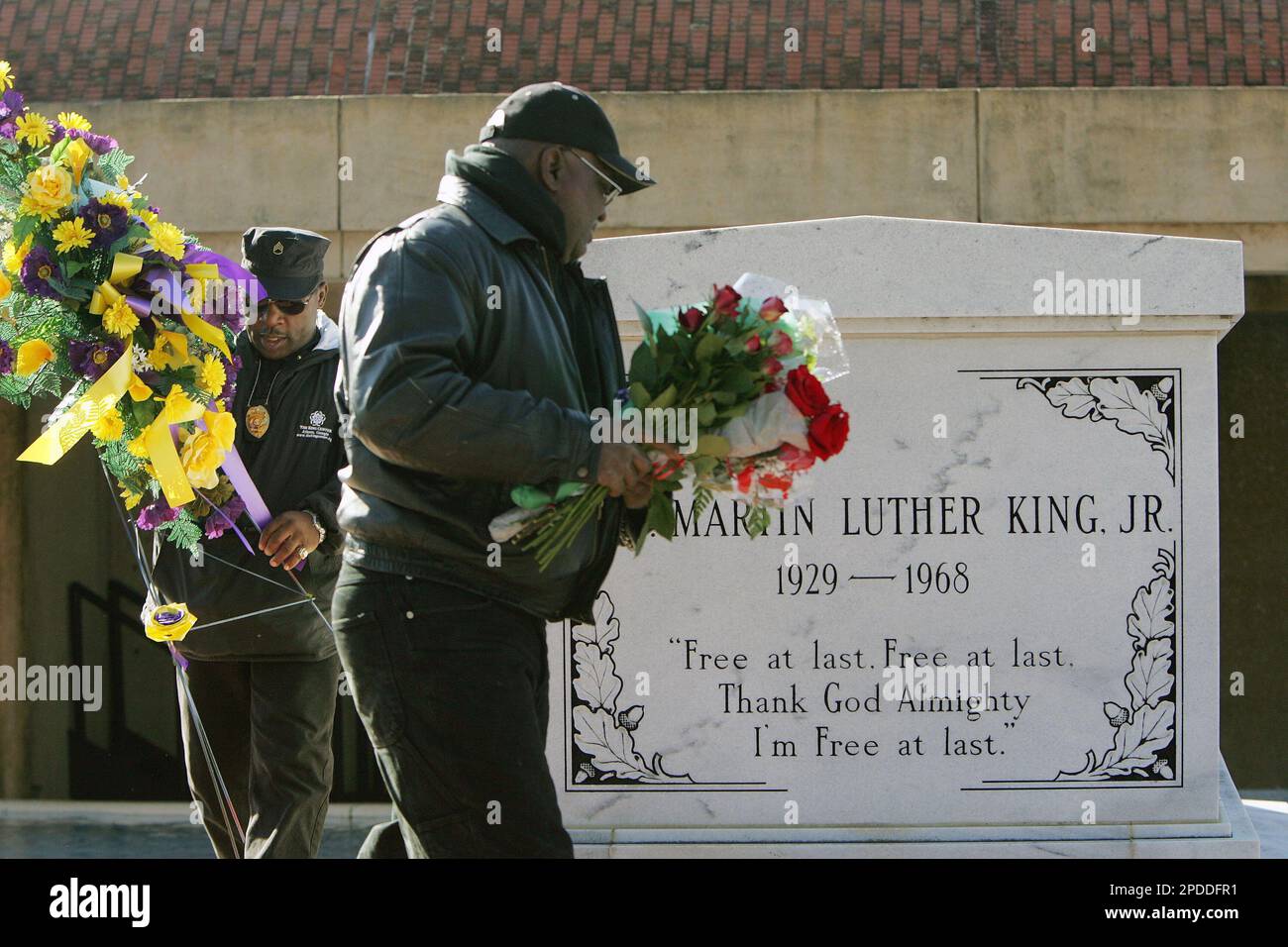 King Center employee Bobby Blacklock, right, and an unidentified ...