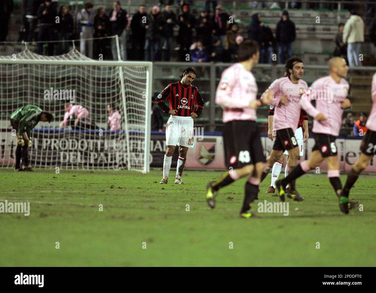 AC Milan defender Alessandro Nesta, center, reacts after Palermo ...