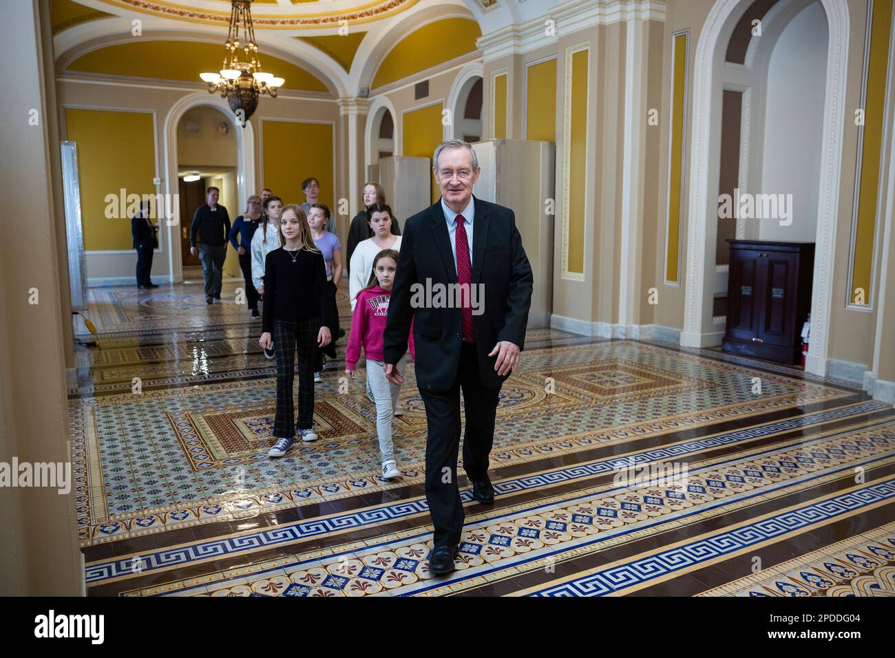 Sen. Mike Crapo (R-Idaho) is seen with a group of visitors at the U.S ...