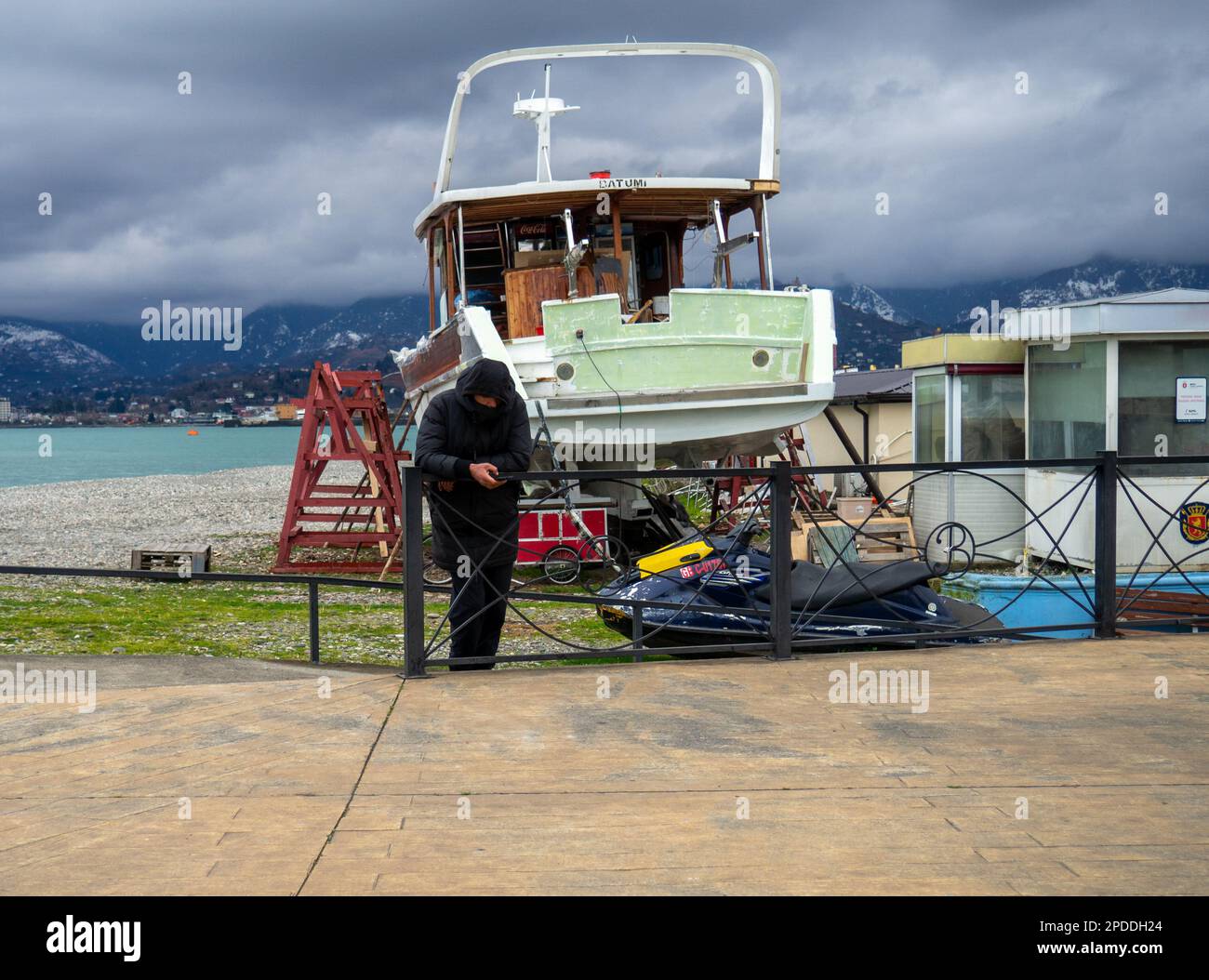 A yacht pulled ashore. Ship repair. Waiting for navigation. Winter ...