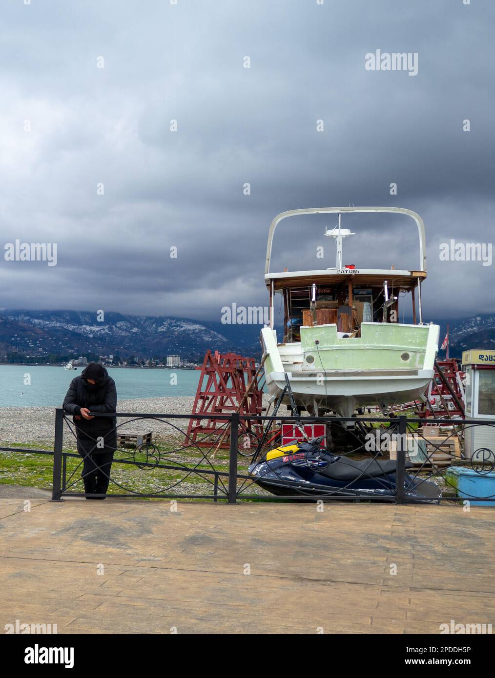 A yacht pulled ashore. Ship repair. Waiting for navigation. Winter ...
