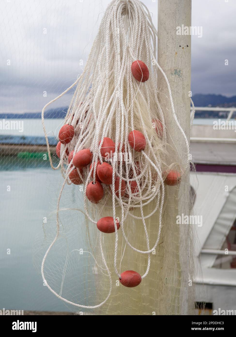 Fishing nets with floats on a pole. Drying networks. Fishing equipment ...