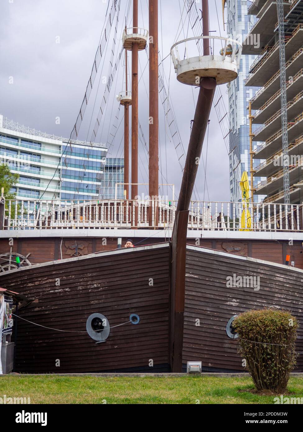 Restaurant in the form of a ship. Ship shape structure. Wooden building ...