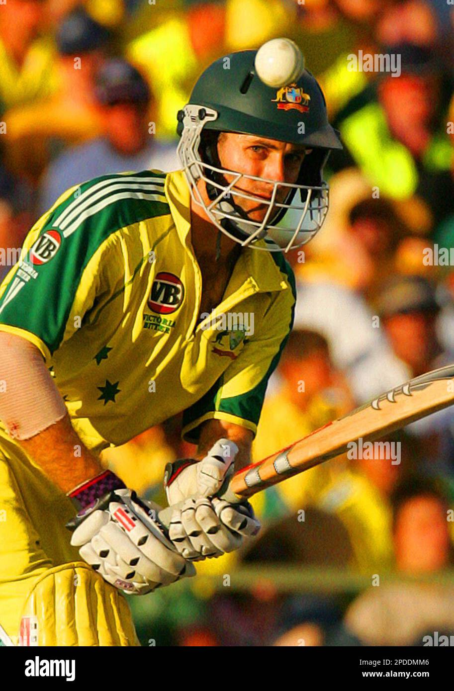 Australia's Simon Katich dispatches a ball from Sri Lanka's Dilhara ...