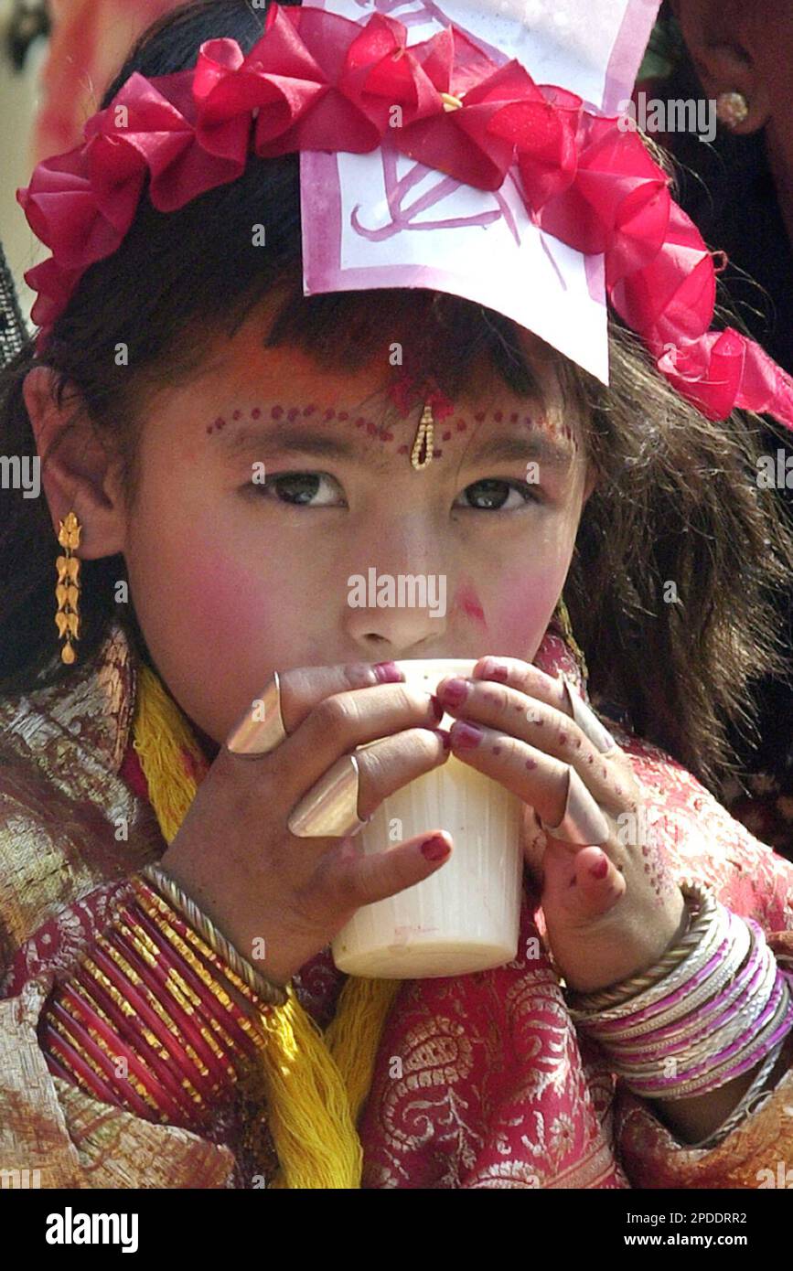 Dressed as a bride Samina Joshi, 7, drinks milk after marriage to a ...