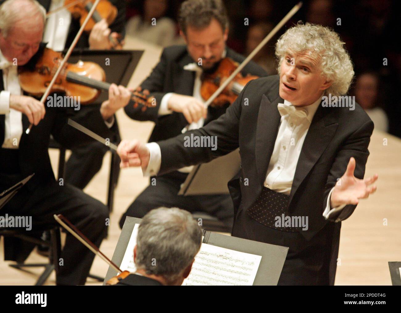 Sir Simon Rattle conducts the Berliner Philharmoniker during Symphony No.38 in D Major by ...