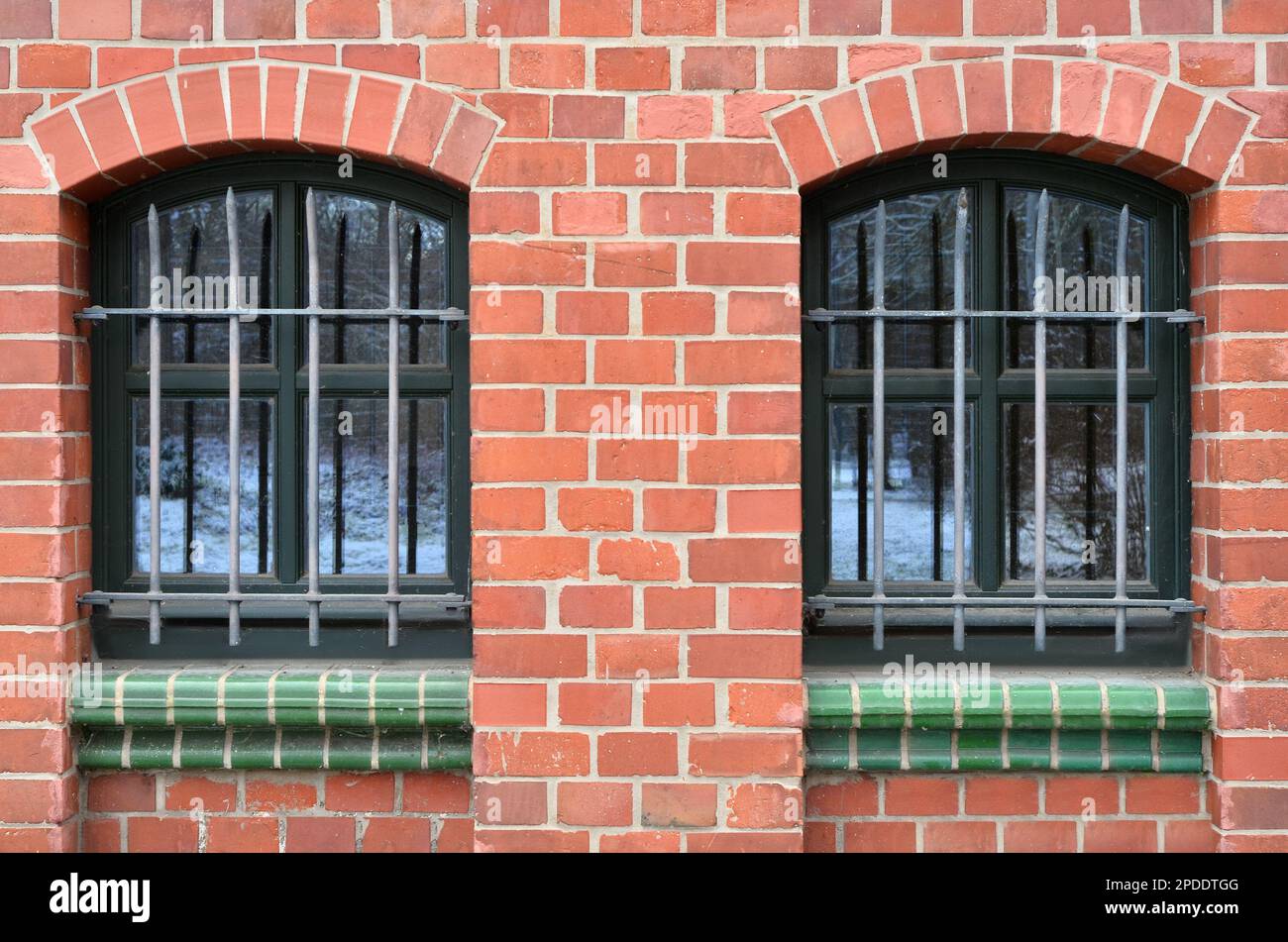 View of brick building with windows Stock Photo - Alamy