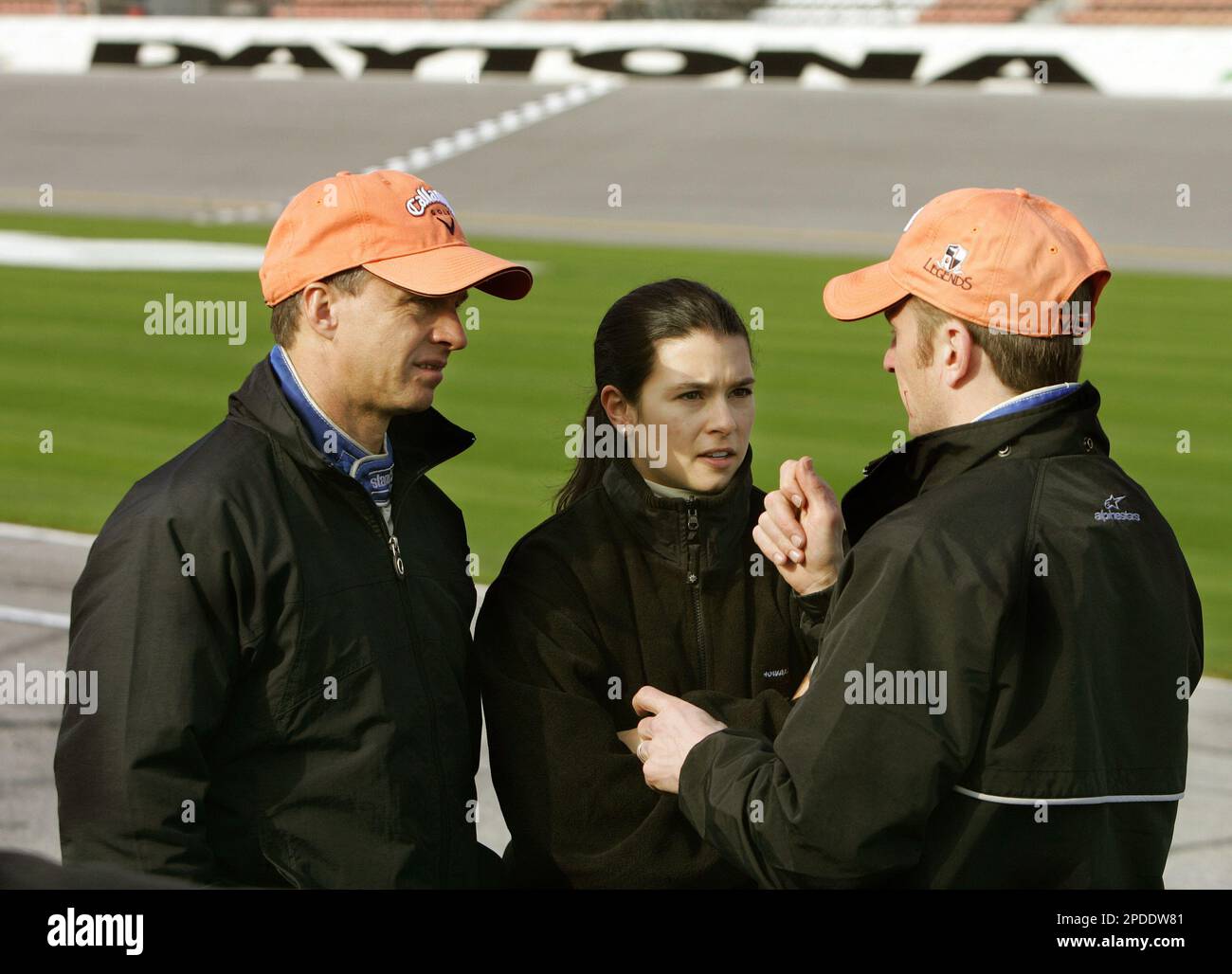 Drivers Jan Lammers, Danica Patrick and Allan McNish, from left, chat ...