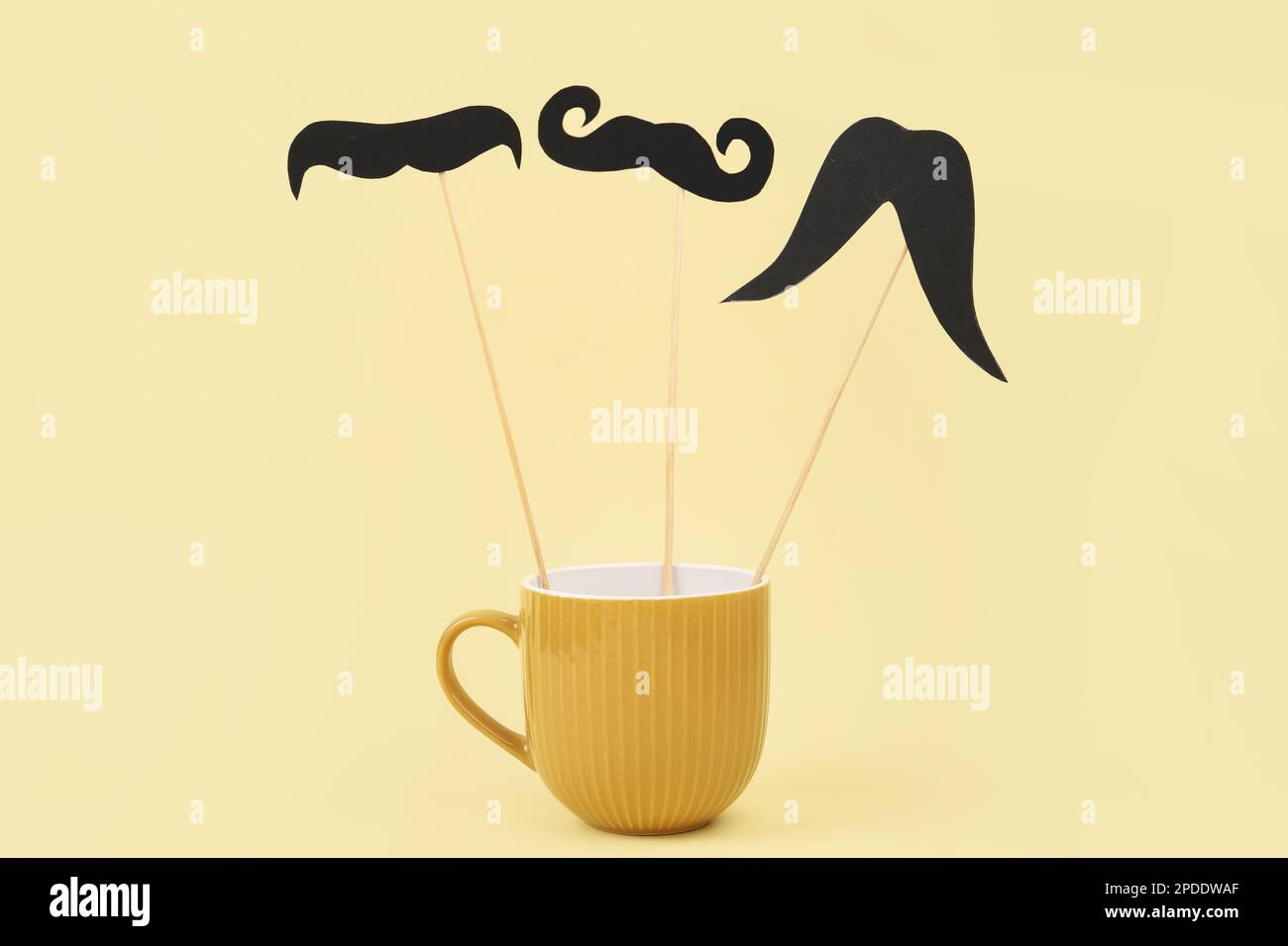 Paper mustaches on wooden sticks in cup against color background Stock ...