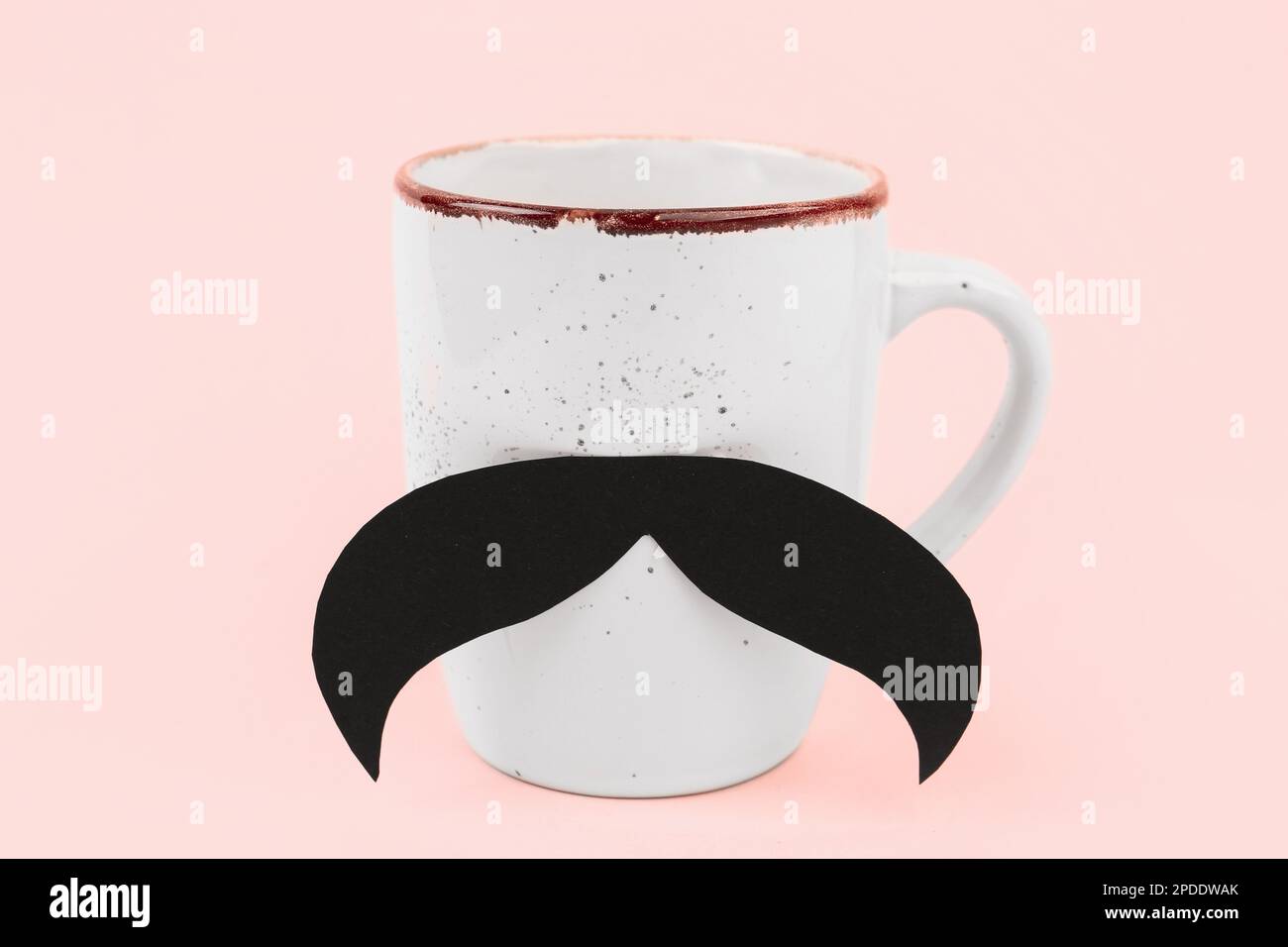Ceramic cup with paper mustache on pink background Stock Photo - Alamy