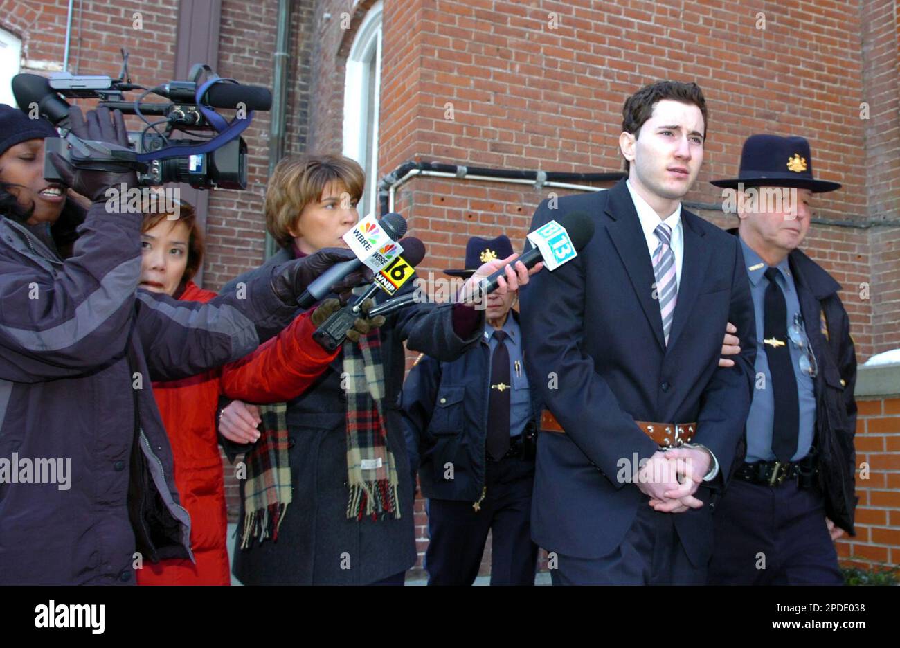 Gregory Rowe, 19, is led from the courthouse in Milford, Pa., on ...