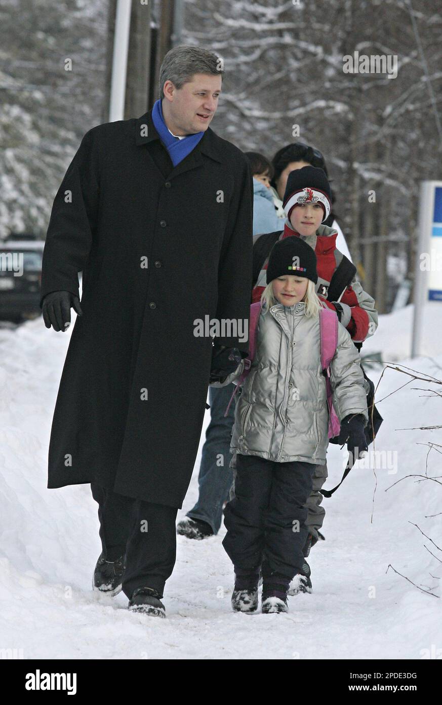 Prime minister-designate Stephen Harper walks to school with his son ...
