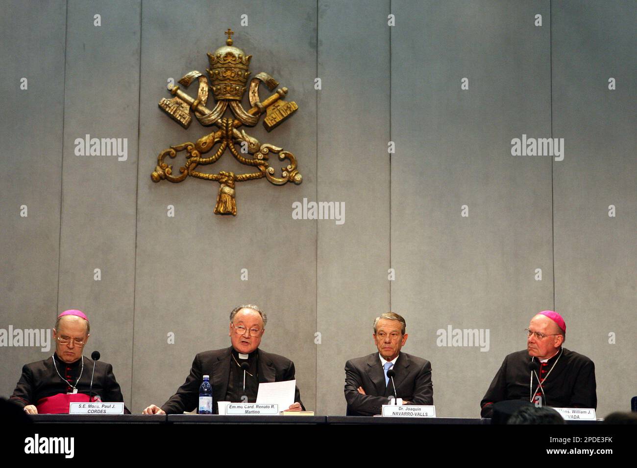 From left, archbishop Josef Cordes, cardinal Renato Martino, papal ...