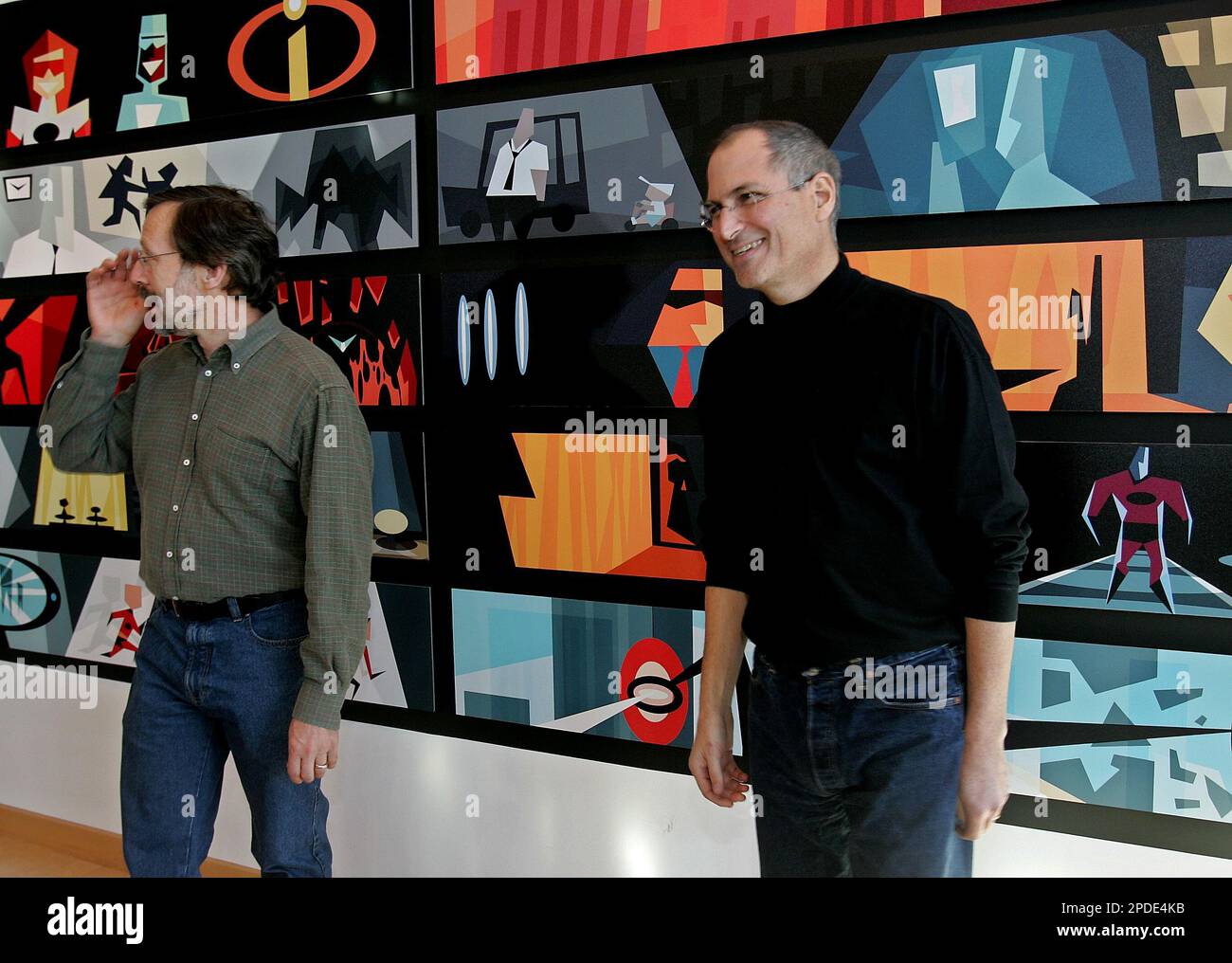 Pixar Animation Studios Inc. CEO Steve Jobs, right, smiles next to Ed ...