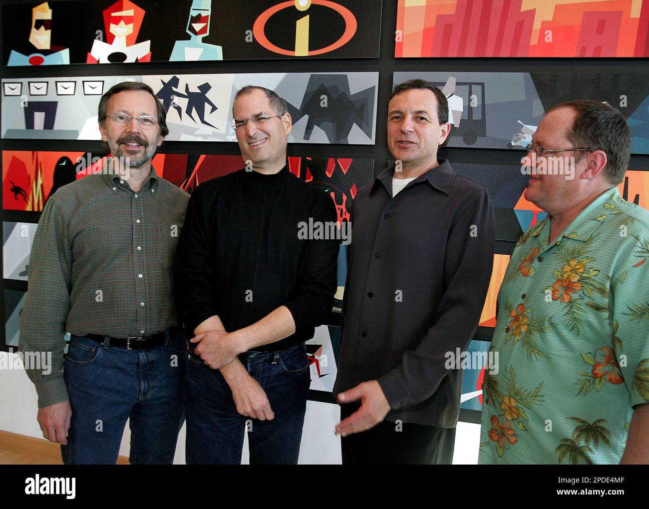 Walt Disney Co. CEO Robert Iger, center right, smiles with Pixar ...
