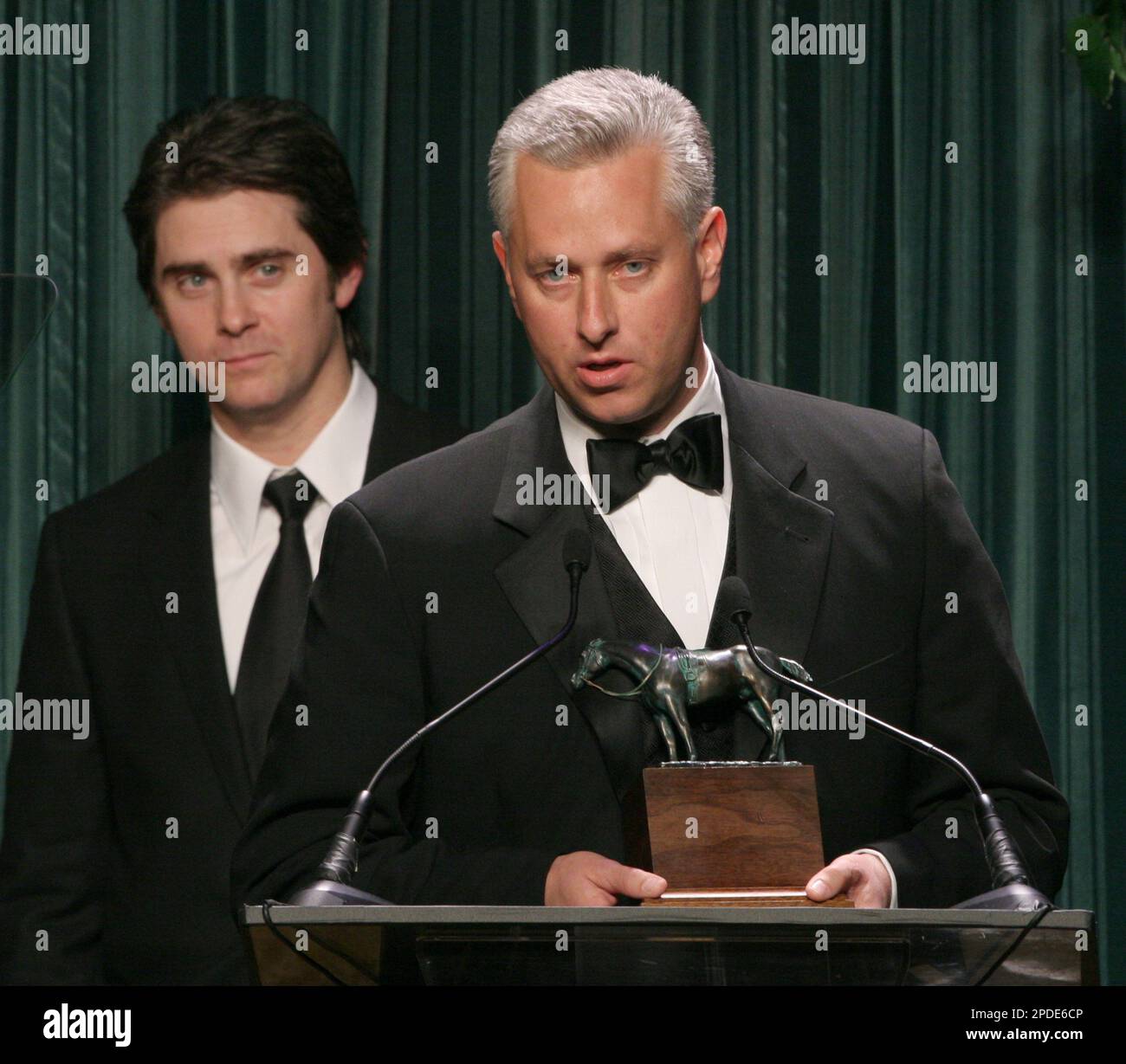 Todd Pletcher, front, accepts the Eclipse Award for champion Trainer of ...