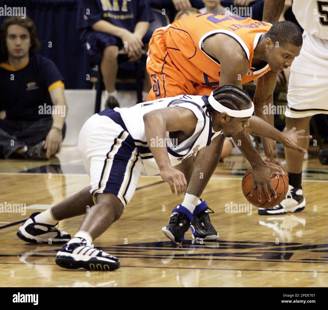 Pittsburgh's LeVance Fields, left, and Syracuse's Louie McCroskey go ...