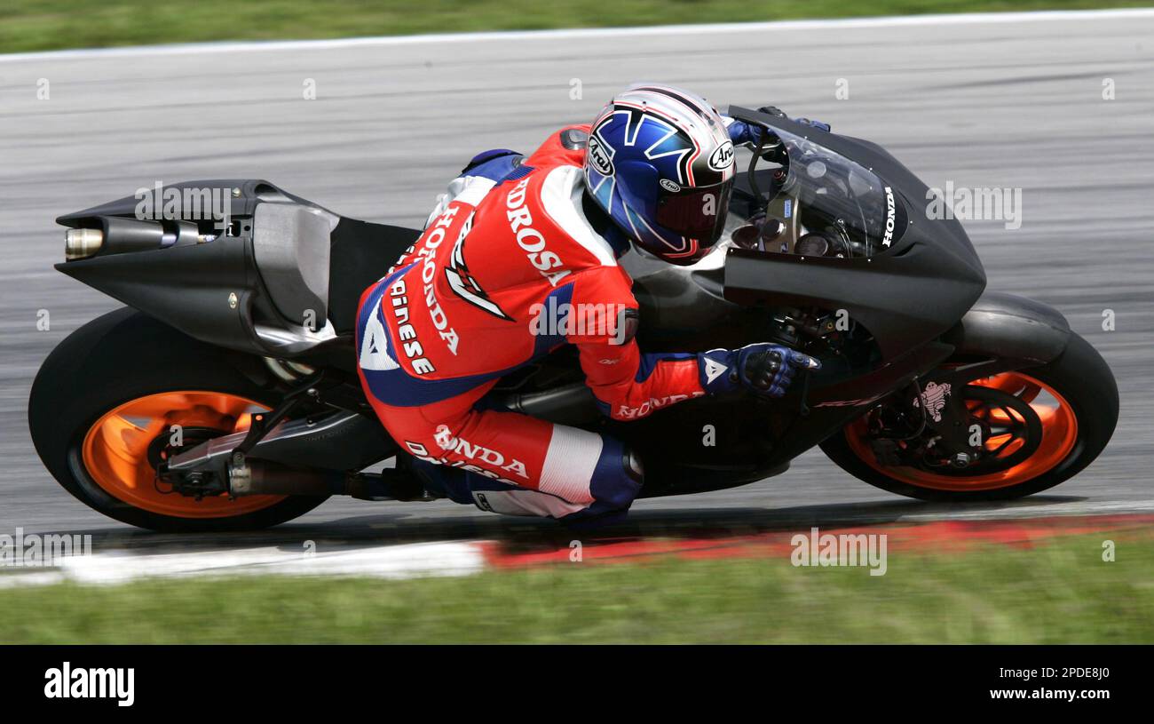 Spanish MotoGP rider Daniel Pedrosa powers his new Honda during a test ...