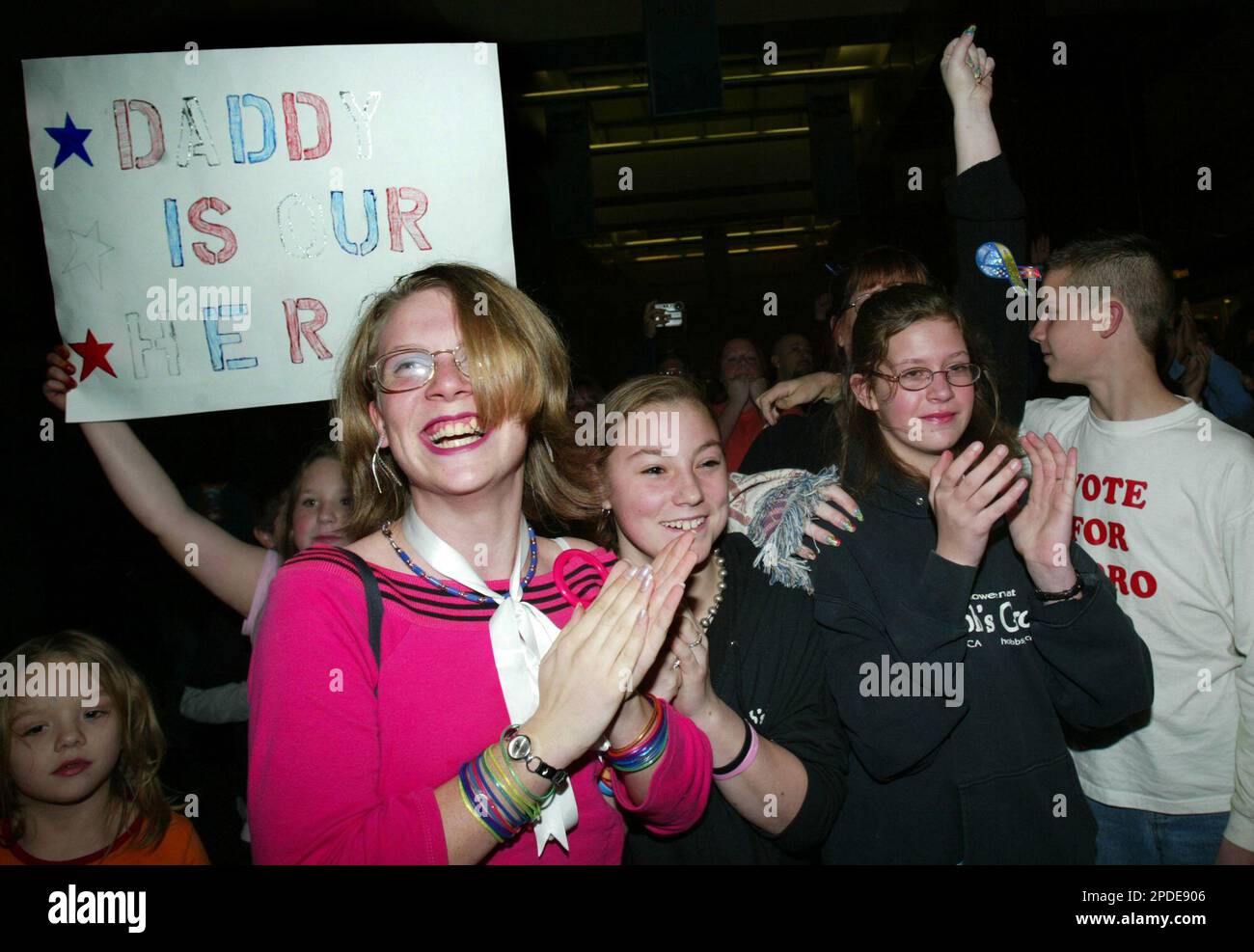 The family of Kevin Stucker cheer as he and fellow soldiers from the ...
