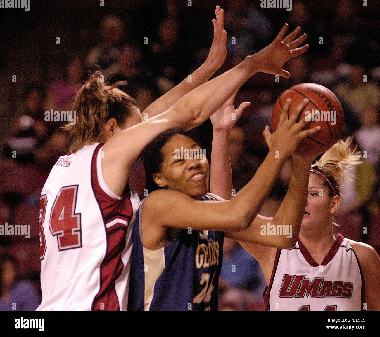 George Washington's Corinne Turner inches her way past Patrycja Gulak ...